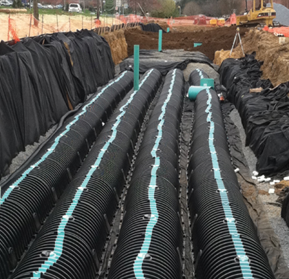 Cultec Chambers Solve Infiltration Issues for Business Center - Modern ...